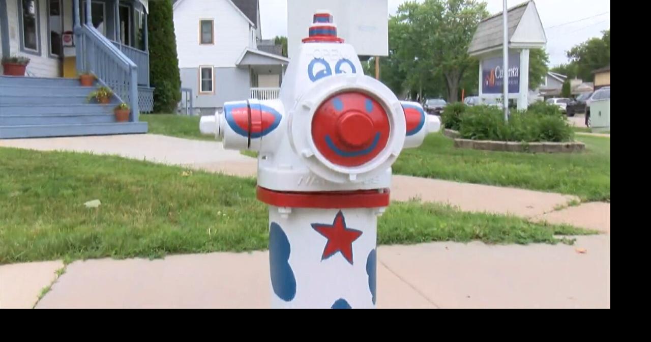 Antigo residents painting fire hydrants in patriotic colors to ...