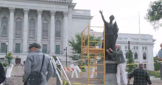Workers reinstall Wisconsin statues downed in 2020 protest | News ...