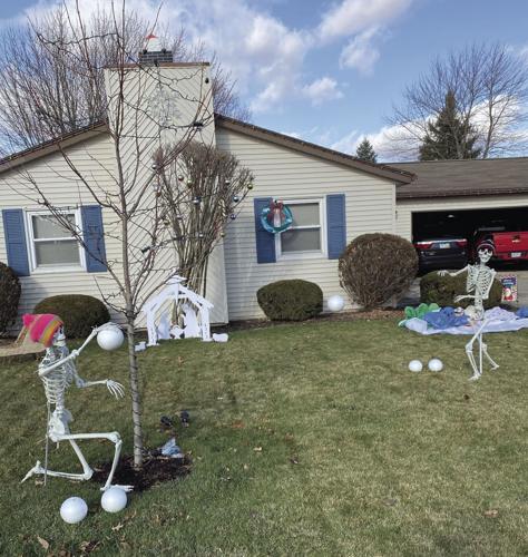 Skeletons spread holiday spirit on Poppy Drive | Photos ...