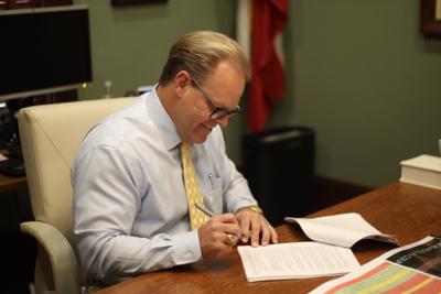 County judge finalizes contract for central building renovations ...
