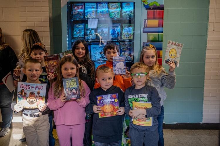 First students use new book vending machine at East Lynn Elementary ...