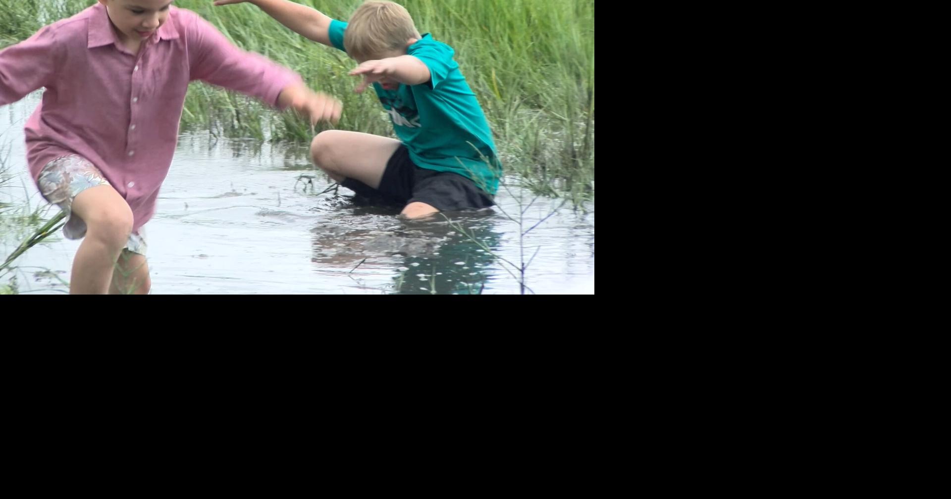 A Wet and Muddy 99th Annual Chincoteague Pony Swim | Latest News | wboc.com