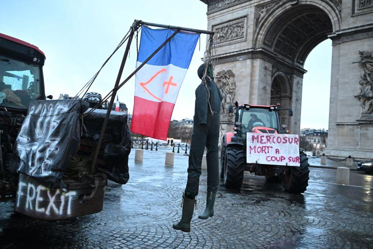 Farmers drive tractors through Paris and block highways in Greece to ...