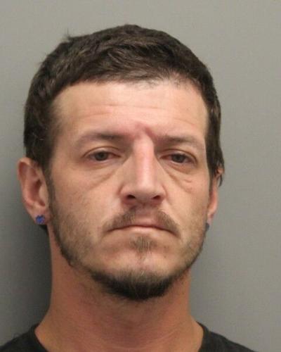 Man on bicycle arrested on weapons and drug-related charges | The ...