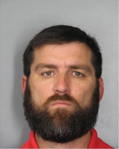 Greenwood man charged with inappropriately touching girls in his care ...