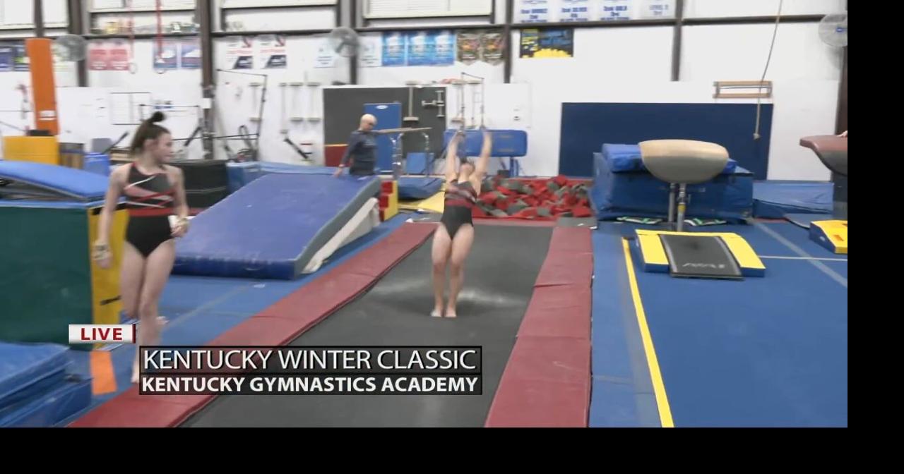 Keith Kaiser watches the gymnasts tumble and vault | | wdrb.com