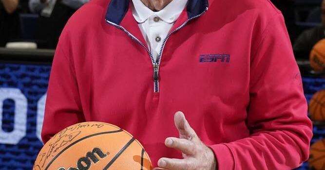 Dick Vitale with autographed basketball | | wdrb.com