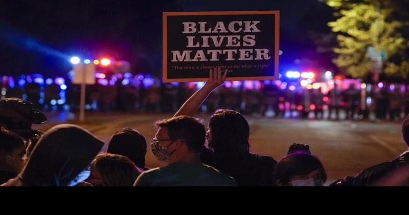 BLM sign at Wisconsin protest | | wdrb.com