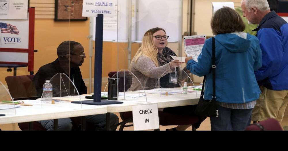 Poll worker during MA primary election | | wdrb.com