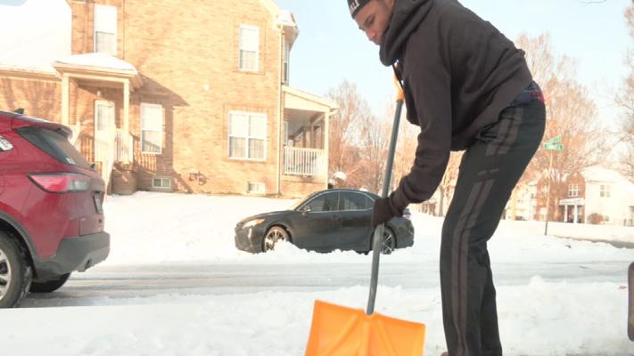 Louisville teens spend snow day shoveling sidewalks in their community ...