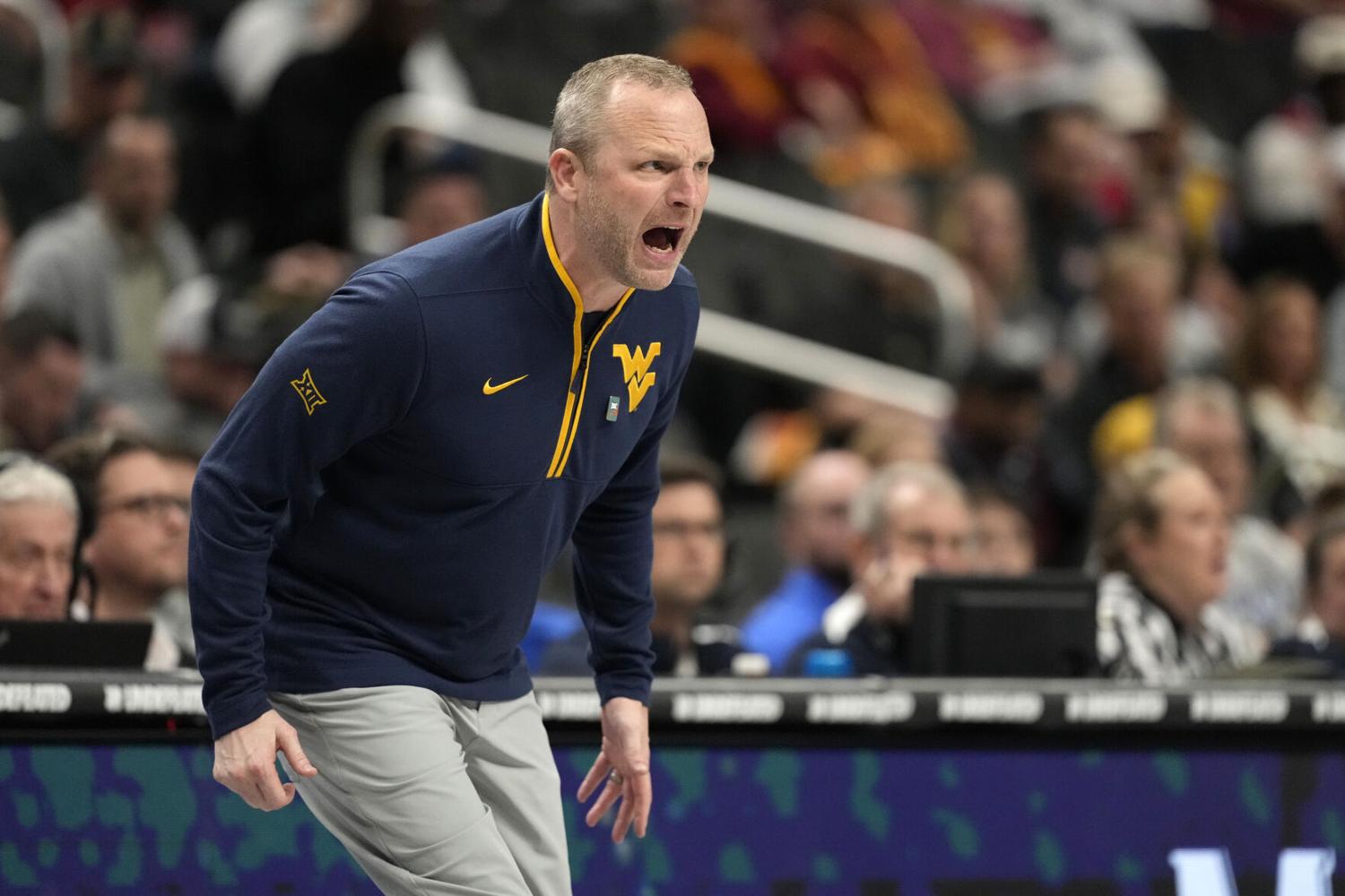 Indiana hires West Virginia coach Darian DeVries as new men's ...