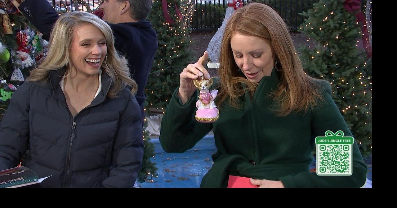 Candyce opens a dog ornament for the Jingle Tree dazzled in pink and ...