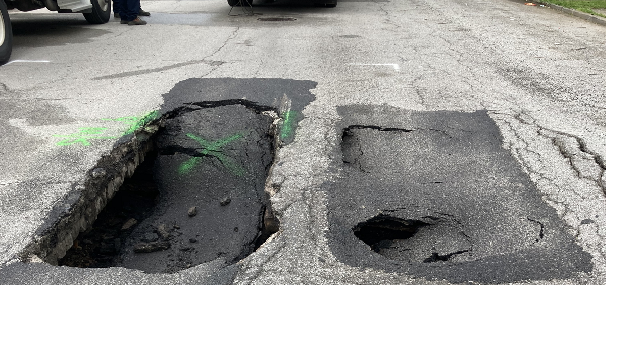 Pavement collapse closes East Liberty between Campbell and Wenzel ...