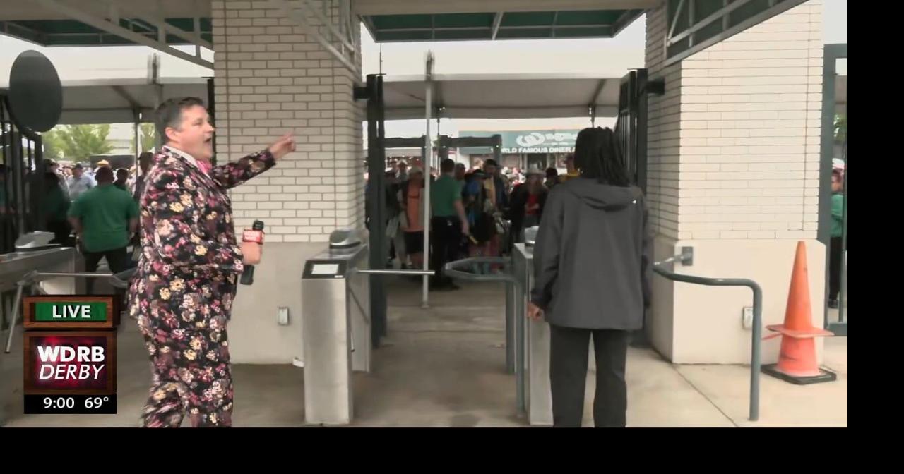 Keith Kaiser greets the first Kentucky Derby 150 visitors as the gates ...