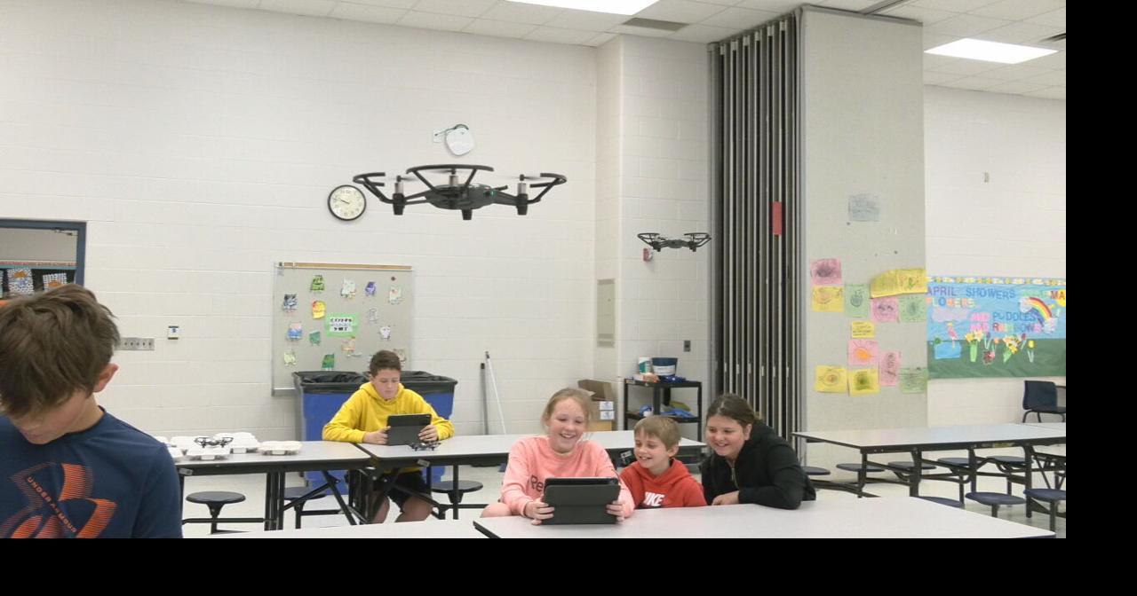 Buckner Elementary School students fly drones through cafeteria after ...