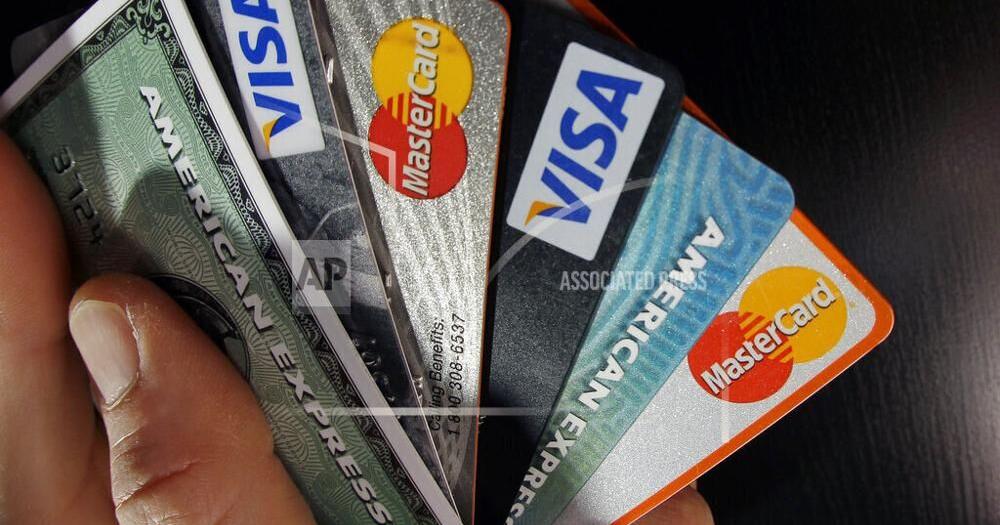 Stocks of credit card companies slump as Wall Street overall drifts in ...