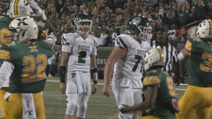 St. Xavier football holds off Trinity in the fourth quarter to claim a ...