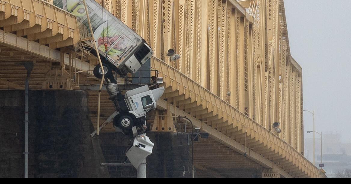 'It's literally hanging off the bridge' | 911 calls released from ...