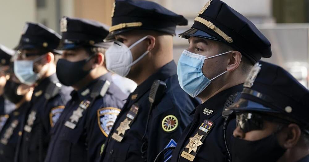 NYPD officers stand in masks | | wdrb.com