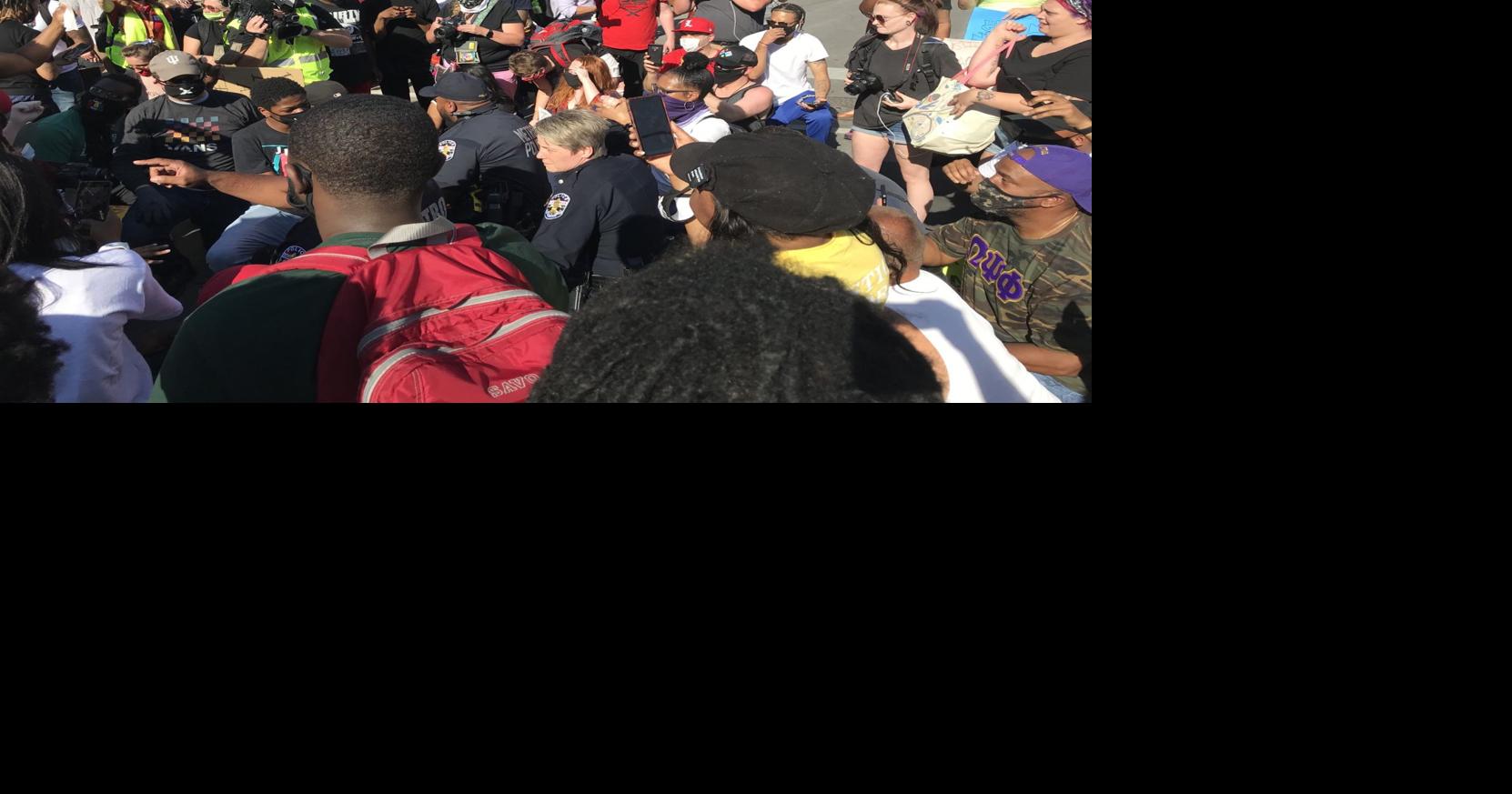 Officers kneel with crowd downtown 6-1-20 | | wdrb.com