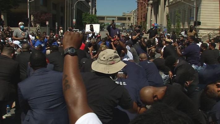 Hundreds of black men gather in solidarity for peaceful protest in ...