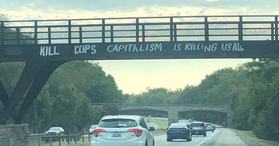 Anti-police graffiti on I-64 leads to call for support of law ...