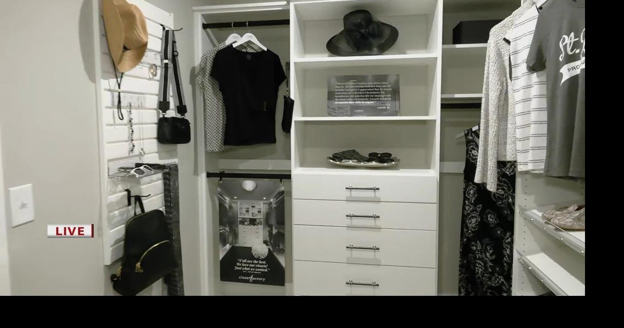 Keith Kaiser checks out one of the home's walk-in closets | | wdrb.com