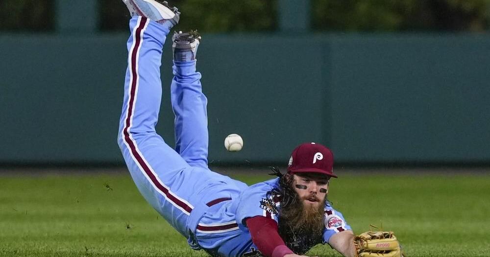 Phillies' Brandon Marsh trying to catch in outfield during Game 5 of WS ...