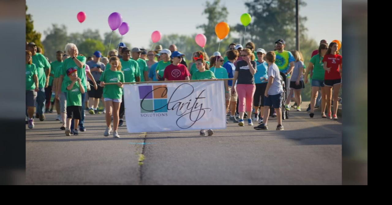 Group that provides resources for pregnant women holding 'Walk For Life ...