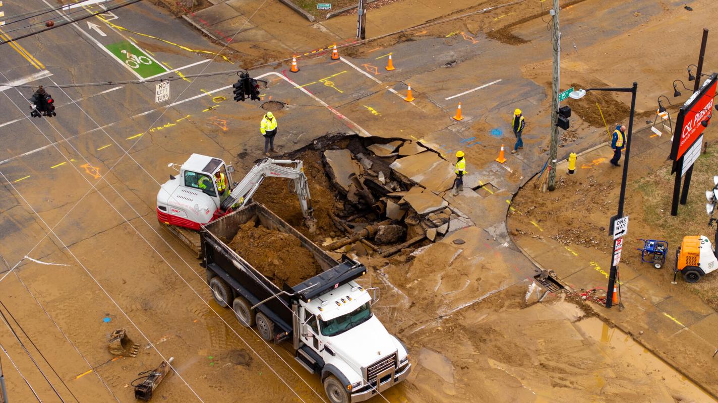 Water main break opens massive hole in Louisville intersection | Local ...