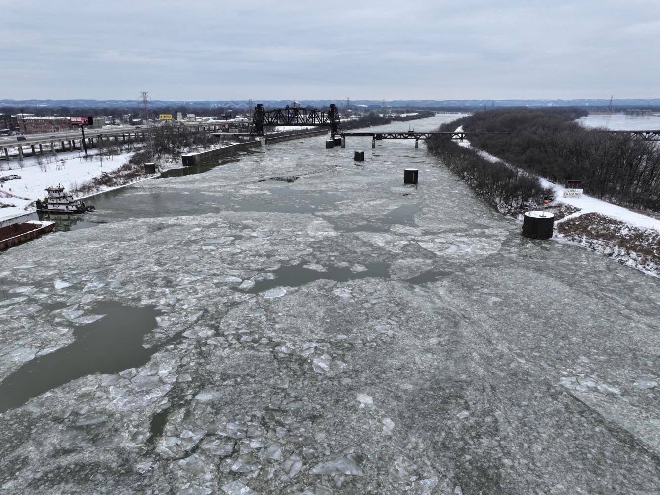 Ice buildup slows vessel traffic on Ohio River at McAlpine Locks ...