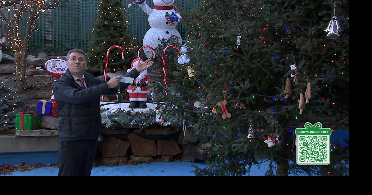 Jude fills the first Jingle tree and moves onto the next one with more ...