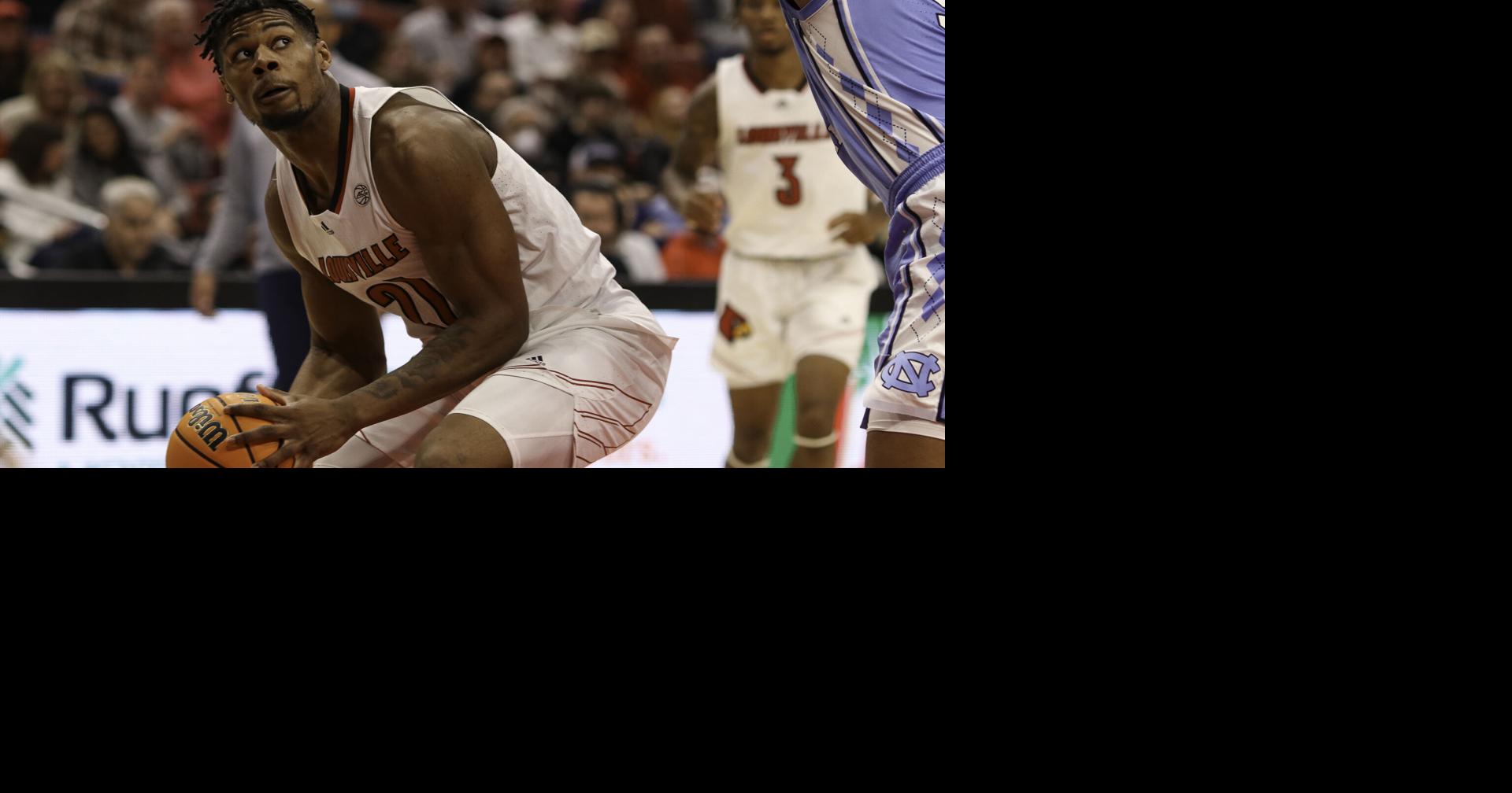 Back in red: Sydney Curry says he'll stay with Louisville basketball ...