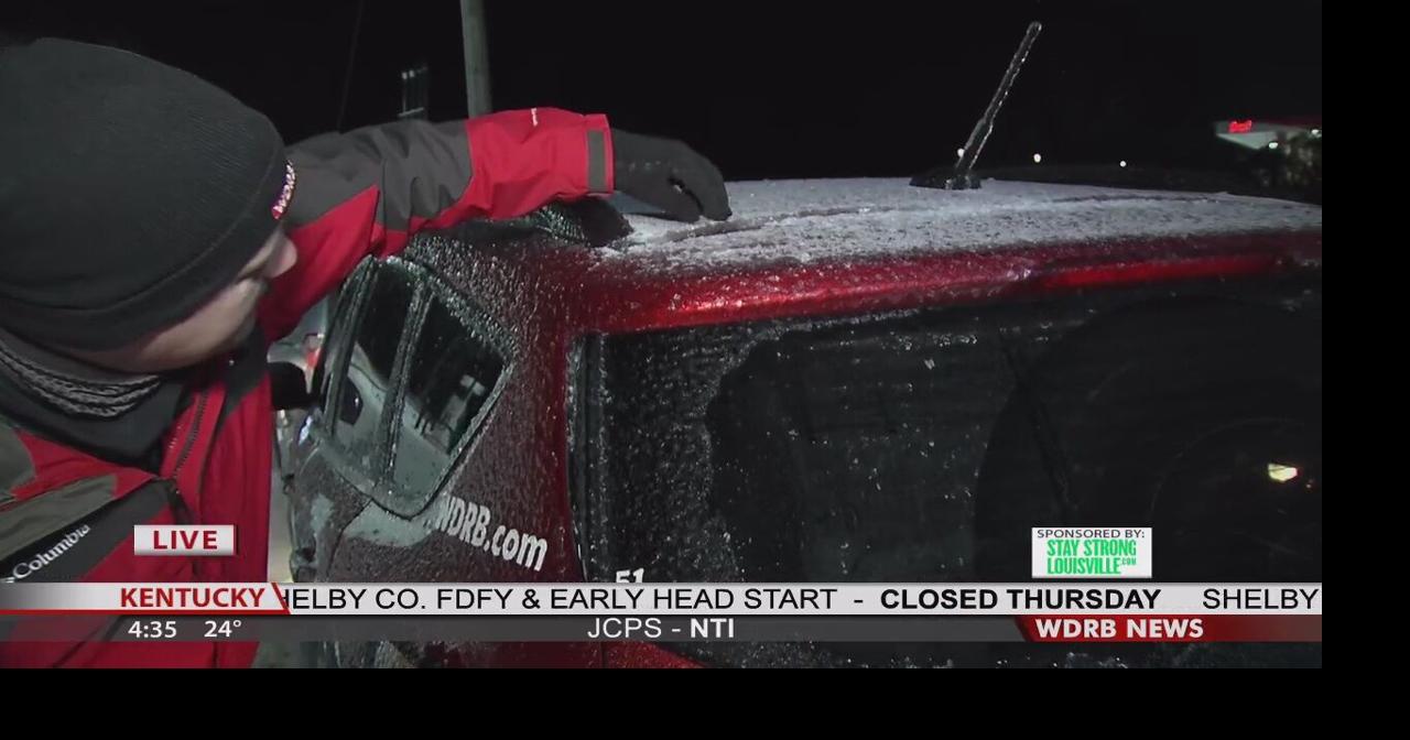 Keith Kaiser chips away at ice in New Albany after winter storm ...