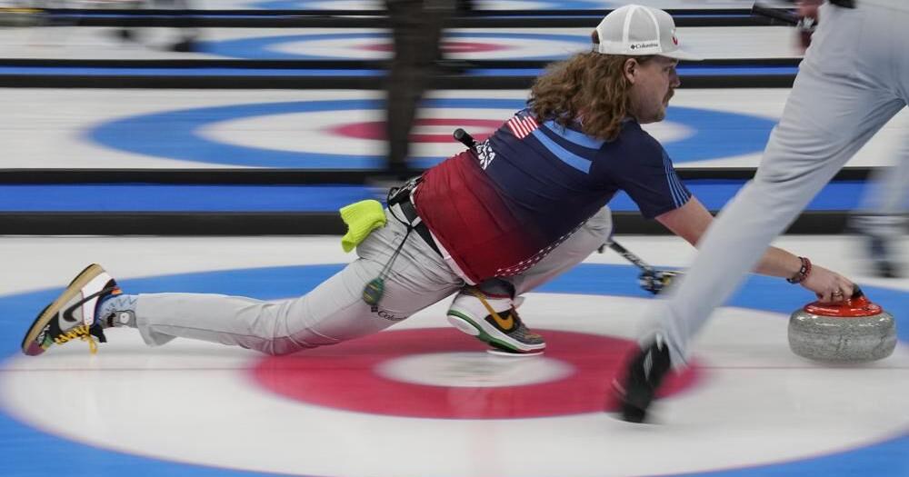 US curler Matt Hamilton throws a stone at men's curling match | | wdrb.com
