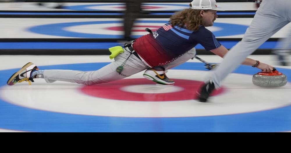 US curler Matt Hamilton throws a stone at men's curling match | | wdrb.com