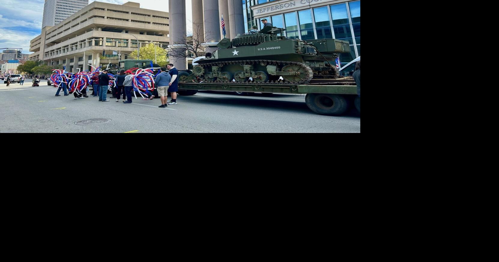Veterans honored in Louisville parade with flyover, military displays ...