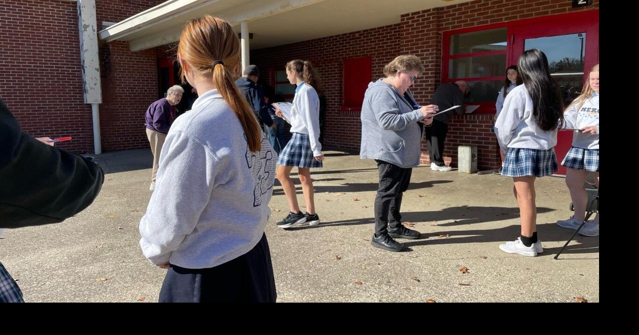 Mercy Academy students conduct exit polls at Seneca High School voting ...