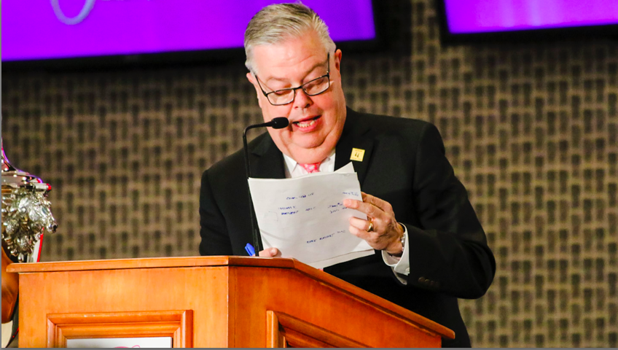 Louisville honors the late John Asher with Hometown Hero banner at ...