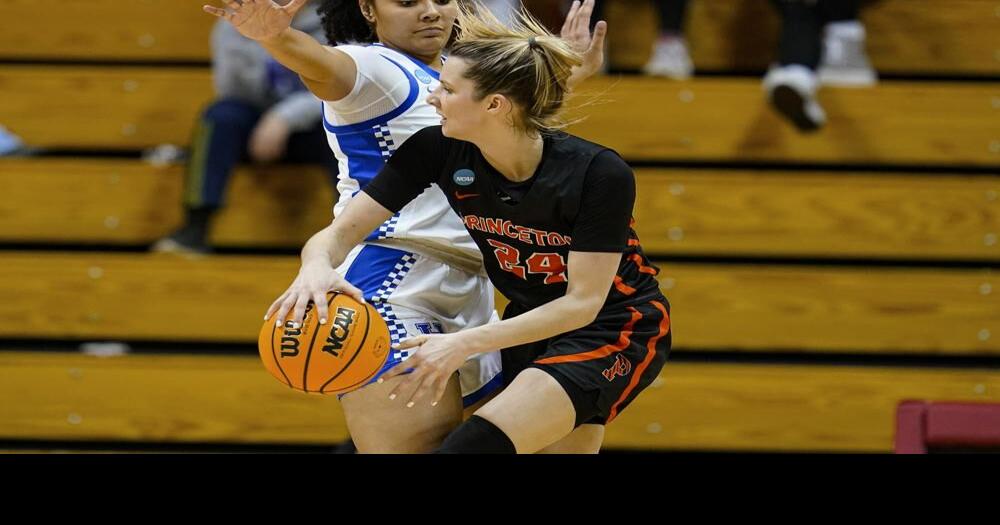 Princeton guard Julia Cunningham makes a pass around Kentucky guard ...
