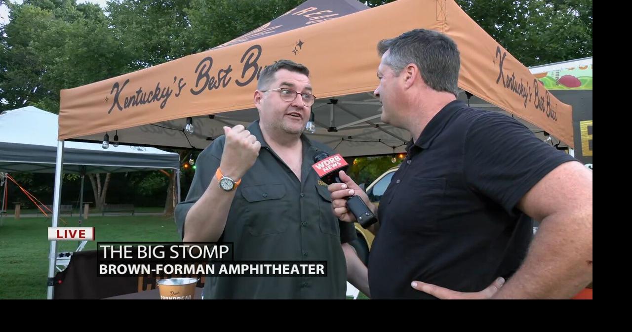 Keith Kaiser checks out a drink vendor at The Big Stomp | | wdrb.com