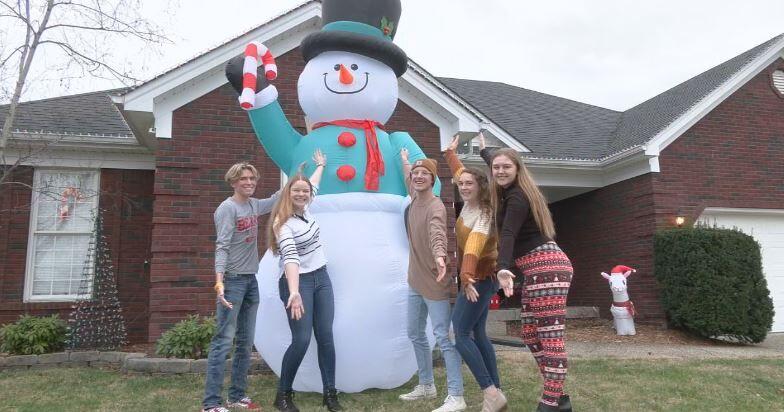 Butler High students spread holiday cheer with giant snowmen ...