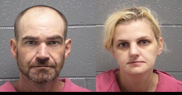Two arrested after children allegedly found living in 'unfit ...