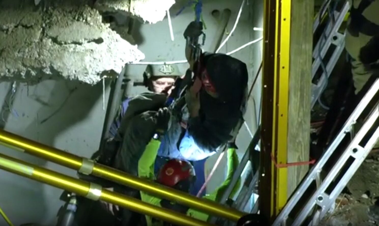 Crews rescue man trapped beneath rubble for 8 hours in Louisville ...