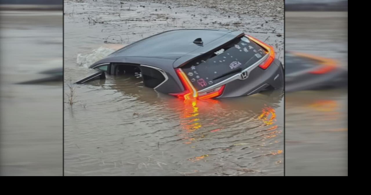 Close Call | Woman pulled from submerged vehicle by off-duty deputy in ...
