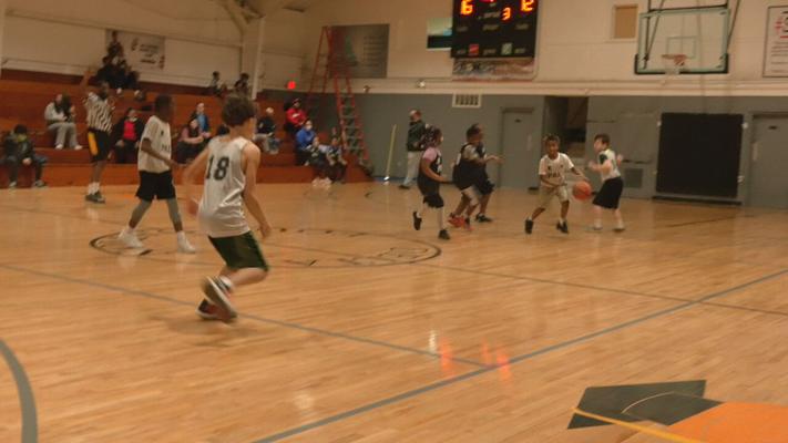 LMPD officers use local basketball league to connect with inner city ...