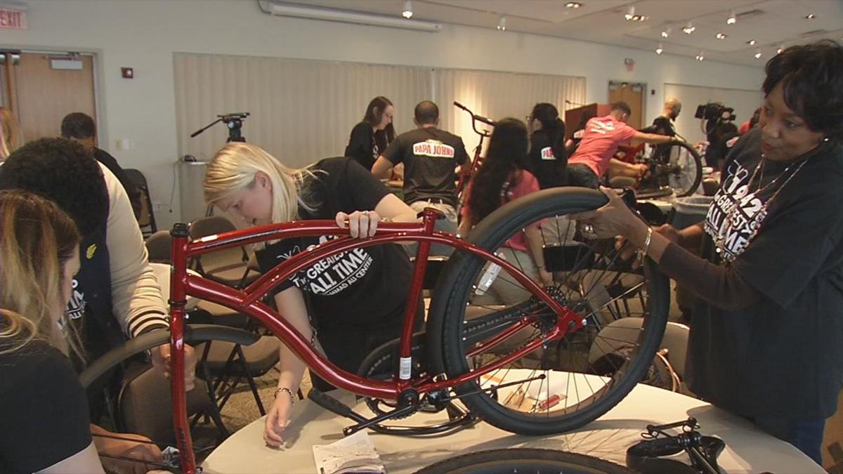 Dozens of red bikes built to honor Muhammad Ali's birthday | News ...