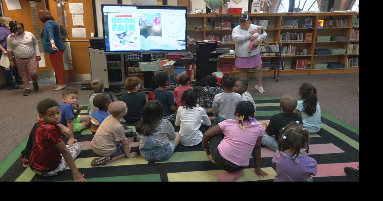 Students at Portland Elementary School receive books from the Addie and ...