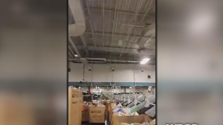 USPS employees show piles of packages, 'total chaos' inside Louisville ...