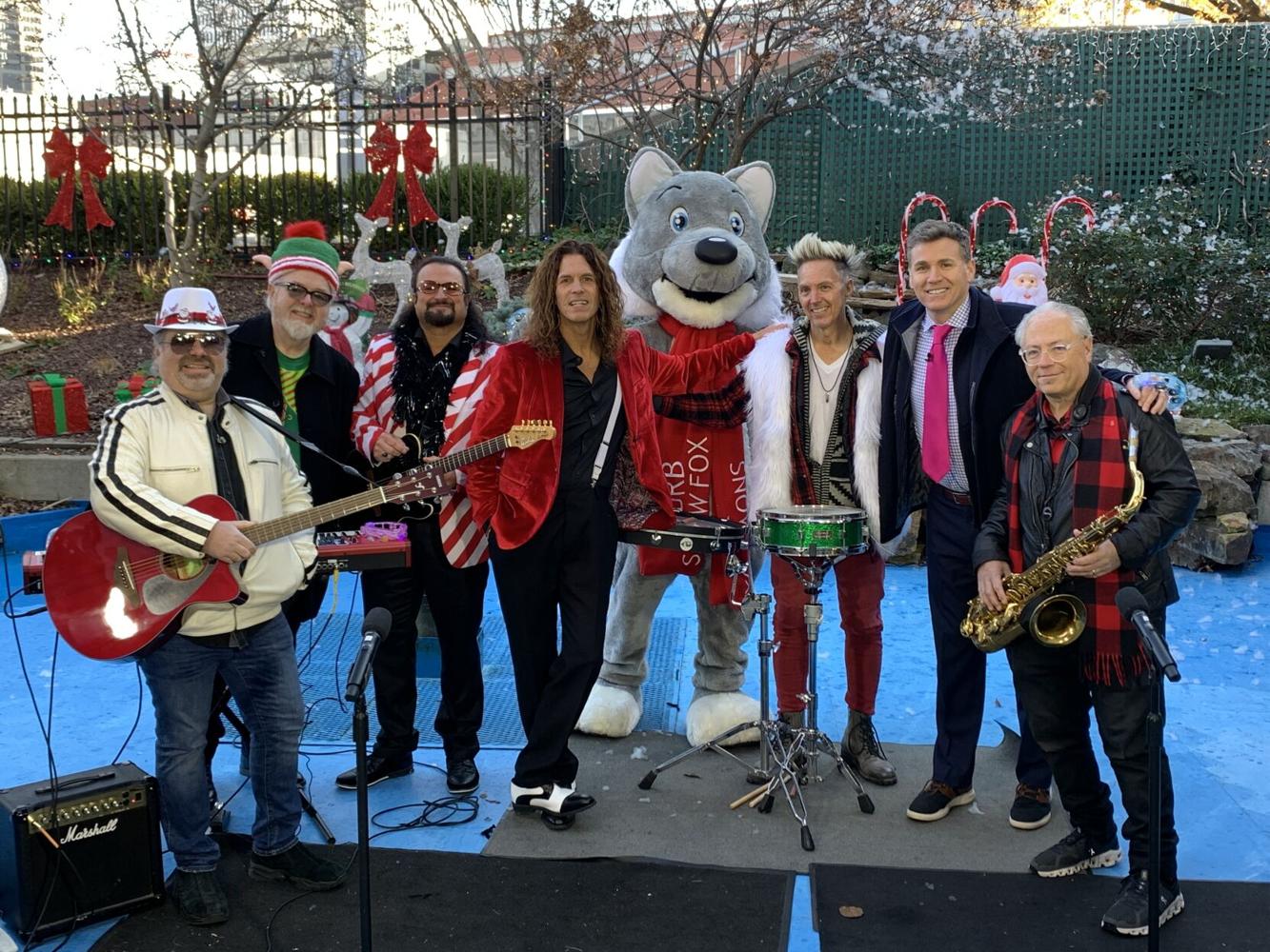 The Crashers rock around Jude's Jingle Tree on WDRB Mornings to help ...